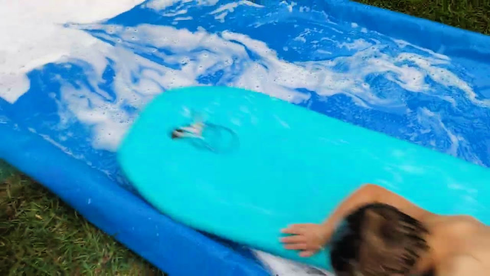 DIY Slip and Slide for Summer Outdoor Play - Blitsy