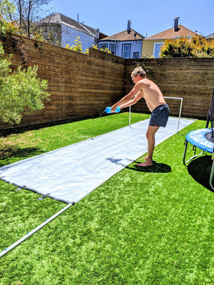 DIY Slip and Slide for Summer Outdoor Play - Blitsy