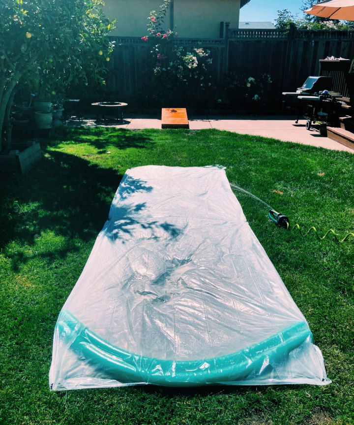 DIY Slip and Slide for Summer Outdoor Play - Blitsy