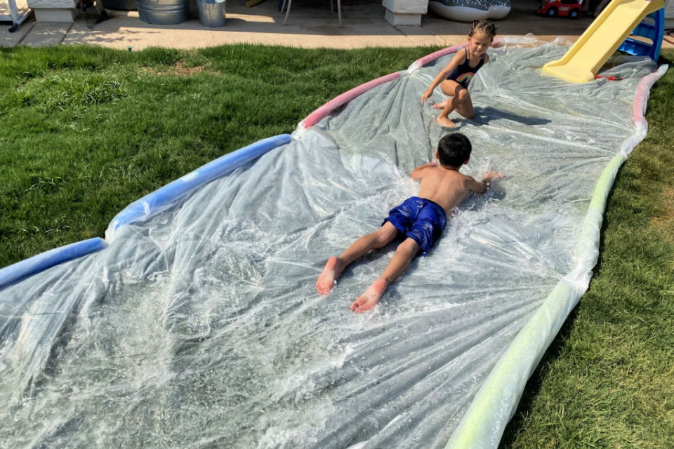DIY Slip and Slide for Summer Outdoor Play - Blitsy
