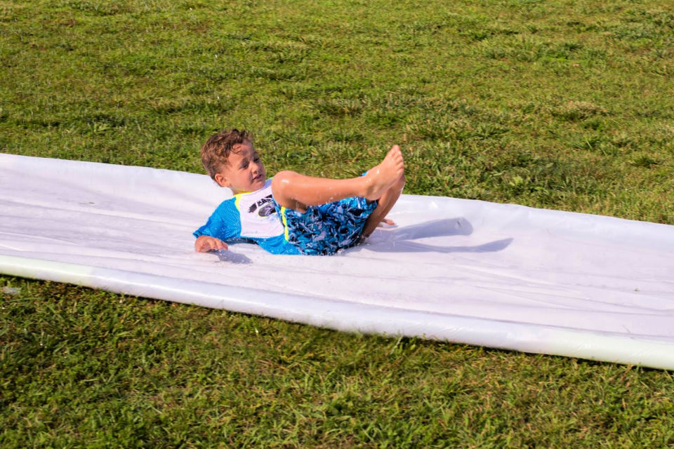 DIY Slip and Slide for Summer Outdoor Play - Blitsy