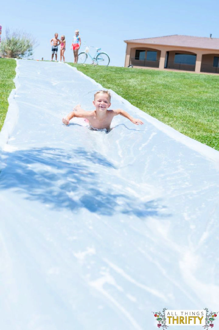 DIY Slip and Slide for Summer Outdoor Play - Blitsy