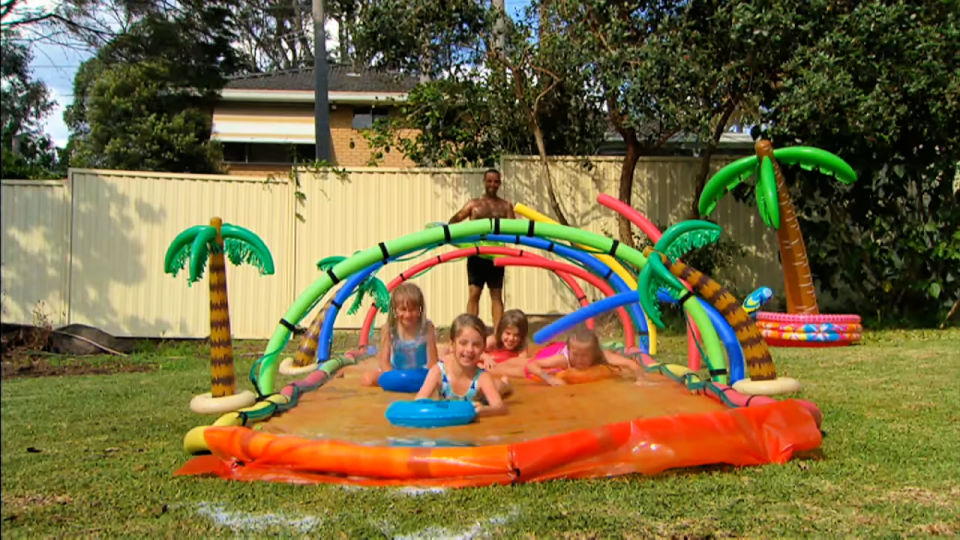 DIY Slip and Slide for Summer Outdoor Play - Blitsy