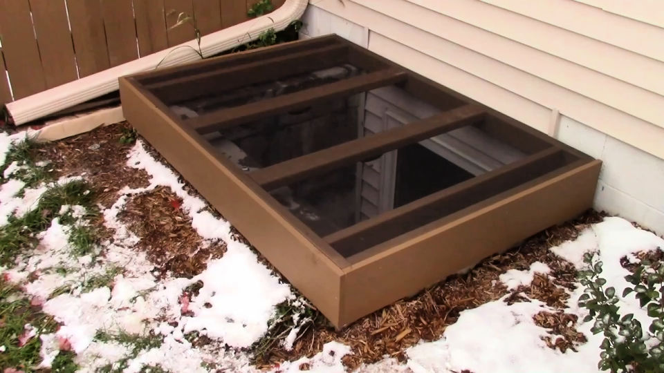 DIY Window Well Cover to Protect Your Basement - Blitsy