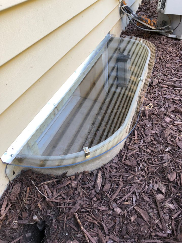 DIY Window Well Cover to Protect Your Basement - Blitsy